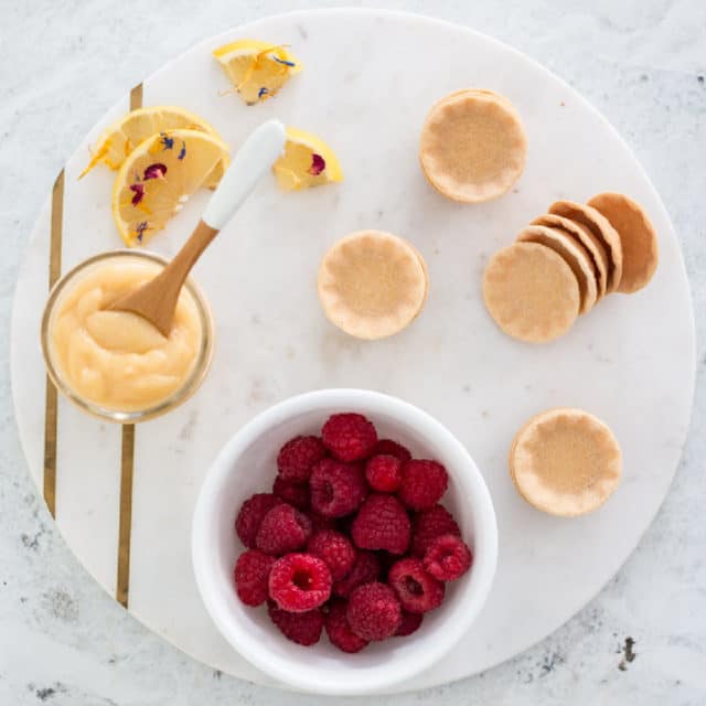Mini Lemon Tarts with Fresh Raspberries - Whole Food Bellies